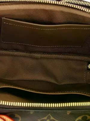 LOUIS VUITTON Utility Monogram Canvas Crossbody Bag