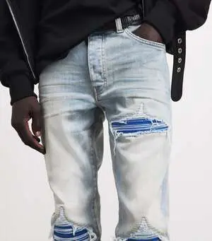 Amiri Ripped Ultrasuede Skinny Jeans