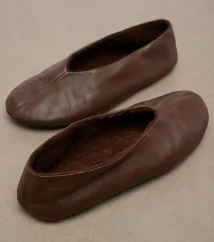 THE ROW Stella Shearling-trimmed Leather Ballet Flats