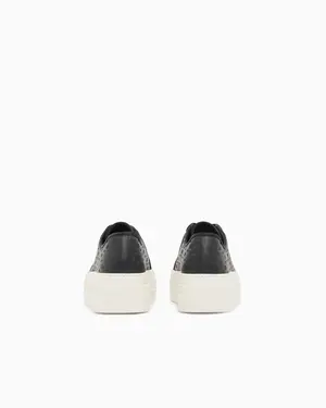 Armani Exchange Low Top Sneakers With All-over Debossed Logo - Black