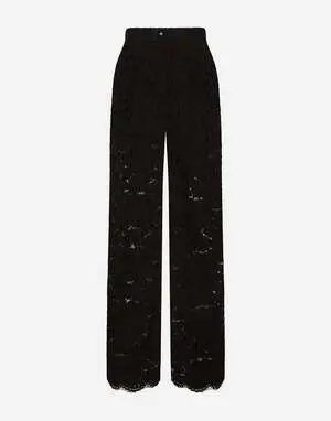 Dolce & Gabbana Flared Floral Cordonetto Lace Pants With Dg Logo Pants And Shorts - Black