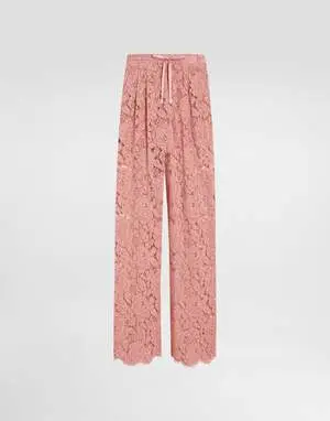 Dolce & Gabbana Flared Floral Cordonetto Lace Pants With Dg Logo Pants And Shorts - Pink