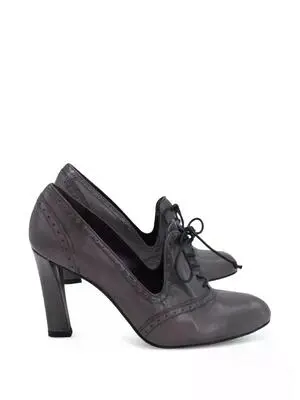 STUART WEITZMAN Lace-up Wingtip Pumps