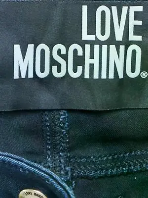 Moschino Distressed Tapered Jeans