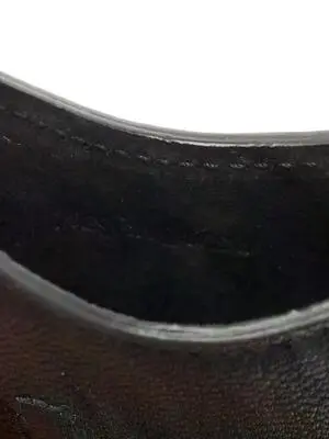 Saint Laurent Logo-embossed Leather Phone Cover