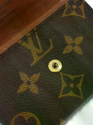 LOUIS VUITTON 2010 Porte Monnaie Plat Monogram Coin Case