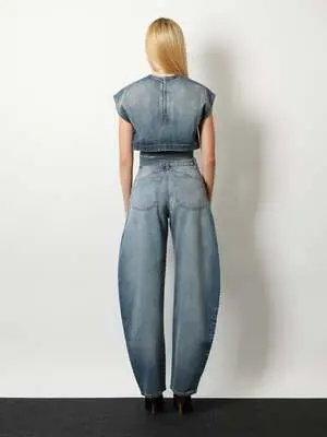 Alaïa Faded Denim Jeans