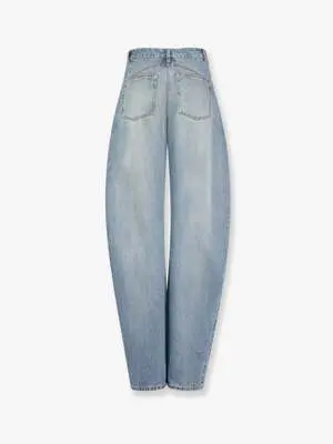 Alaïa Faded Denim Jeans