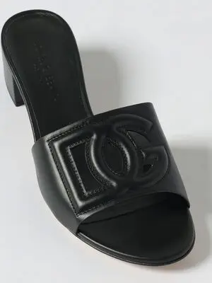 Dolce & Gabbana Calfskin Mules With Cut-out Dg Monogram - Black