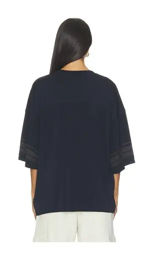NIKESKIMS Stretch Knit V- Neck Top In . Also