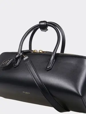 Alaïa Small Leather Handbag With Tubular Handle And Logo Charm - Black