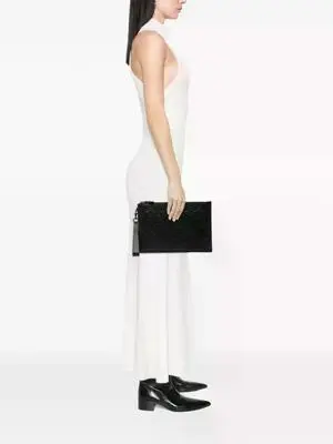 Gucci Embossed Leather Clutch Bag