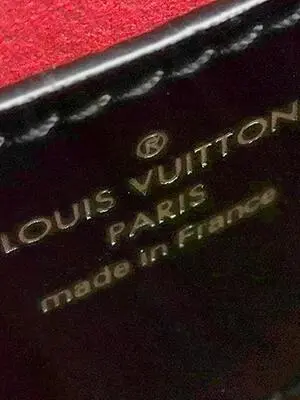 LOUIS VUITTON Epi Malletage Twist Crossbody Bag