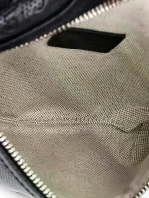 Gucci Gg Embossed Perforated Leather Small Belt Bag
