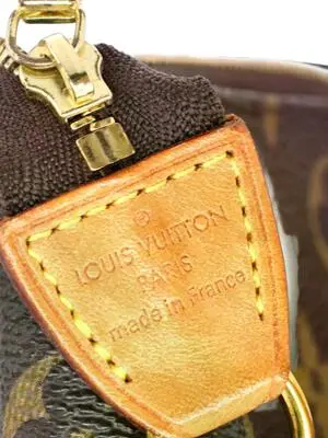LOUIS VUITTON Pochette Accessoires Monogram Canvas Mini Clutch Bag