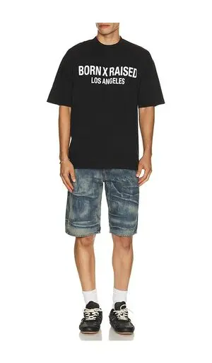 BORN X RAISED Headline Tee In . Also