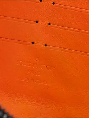 LOUIS VUITTON Alpha Taurillon Leather Wristlet Clutch Bag