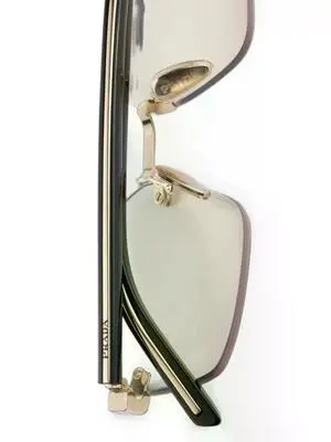 Prada Sunglasses With The Iconic Metal Plaque