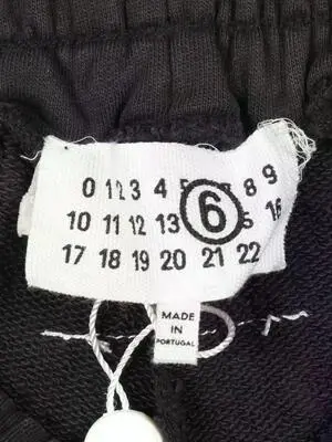 MAISON MARGIELA Newspaper Print Track Pants