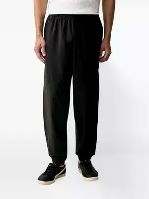 PUMA Logo-print Elasticated-waist Track Pants - Black