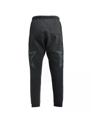 SATOSHI NAKAMOTO Distressed Star-studded Track Pants
