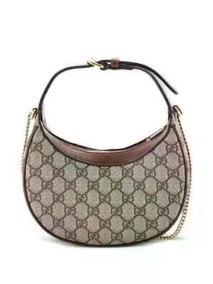 Gucci Interlocking G Patch Half Moon Gg Coated Canvas Mini Hobo Bag - Brown
