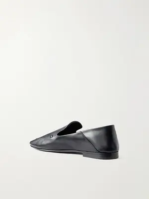 Saint Laurent Alain Cassandre-embellished Leather Loafer
