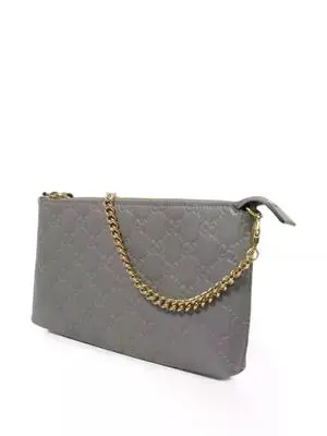 Gucci Gg Embossed Clutch Bag