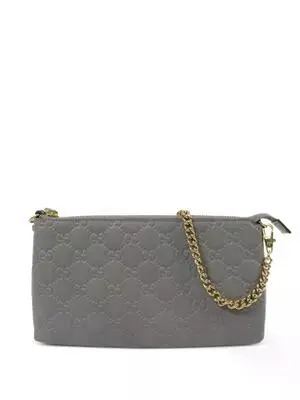 Gucci Embossed Clutches