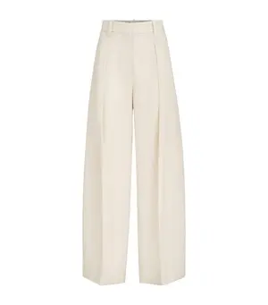 Brunello Cucinelli Virgin Wool Pleated Wide-leg Trousers - Beige