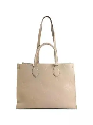 LOUIS VUITTON Mm On The Go Monogram Empreinte Shoulder Bag - Neutrals