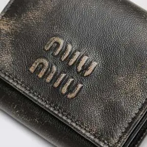 Miu Miu Coffee-coloured Three-compartment Wallet With A Vintage Look