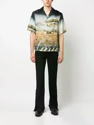 Amiri Flared-leg Cotton Jeans