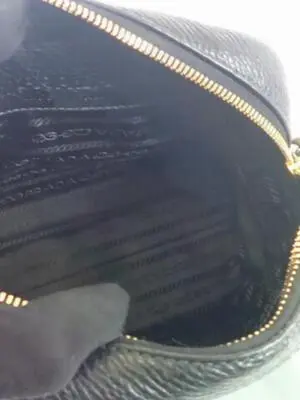 Prada 2013-2026 Vitello Daino Perforated Logo Camera Bag Crossbody Bag