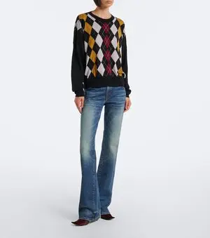 Khaite Low-rise Flared Jeans