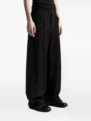 CASEY CASEY Pleated-detail Button-flap Trousers