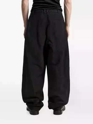 CASEY CASEY Pleated-detail Button-flap Trousers