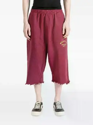 WILLY CHAVARRIA Logo-print Frayed-edge Track Shorts