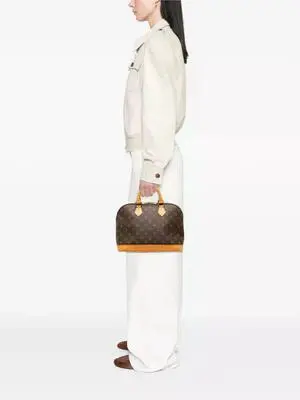 LOUIS VUITTON 2001 Monogram Alma Pm Handbag