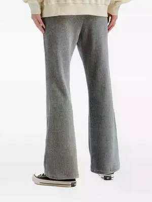 FINGERCROXX Ribbed-knit Logo-patch Flared Trousers