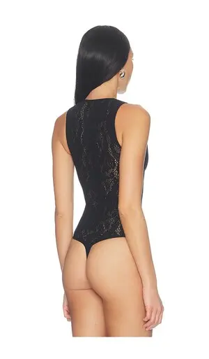 Wolford Infinite Rose Net Bodysuit In . Also