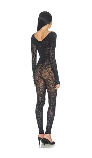 Wolford Infinite Rose Net Jumpsuit In . Also