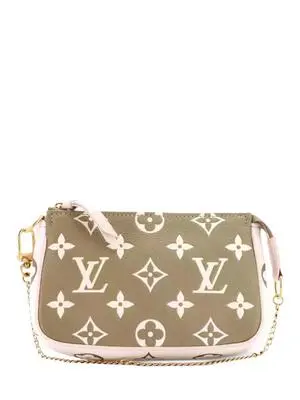 LOUIS VUITTON Louis Vuitton Pochette Accessoires Monogram Empreinte Leather Mini Clutch Bag Neutrals