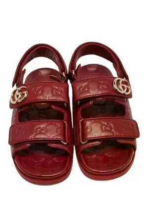 GUCCI Gucci Double-G Embossed Leather Flat Sandals