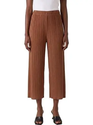 Issey Miyake Pleats Please Issey Miyake Cropped Pleated Crêpe Trousers Brown