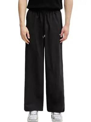 PUMA T7 Logo Print Side Stripe Wide Leg Track Pants - Black