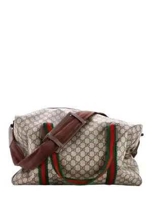 Gucci Gg Coated Canvas Convertible Duffle Bag - Brown