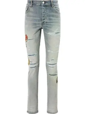 Amiri Travel Patch Repair Skinny Jeans - Blue