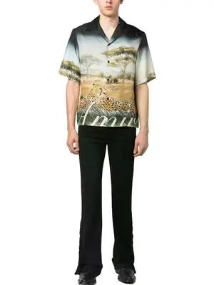 Amiri Flared-leg Cotton Jeans - Black
