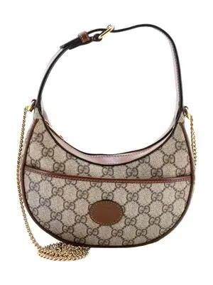 Gucci Interlocking G Patch Half Moon Gg Coated Canvas Mini Hobo Bag - Brown